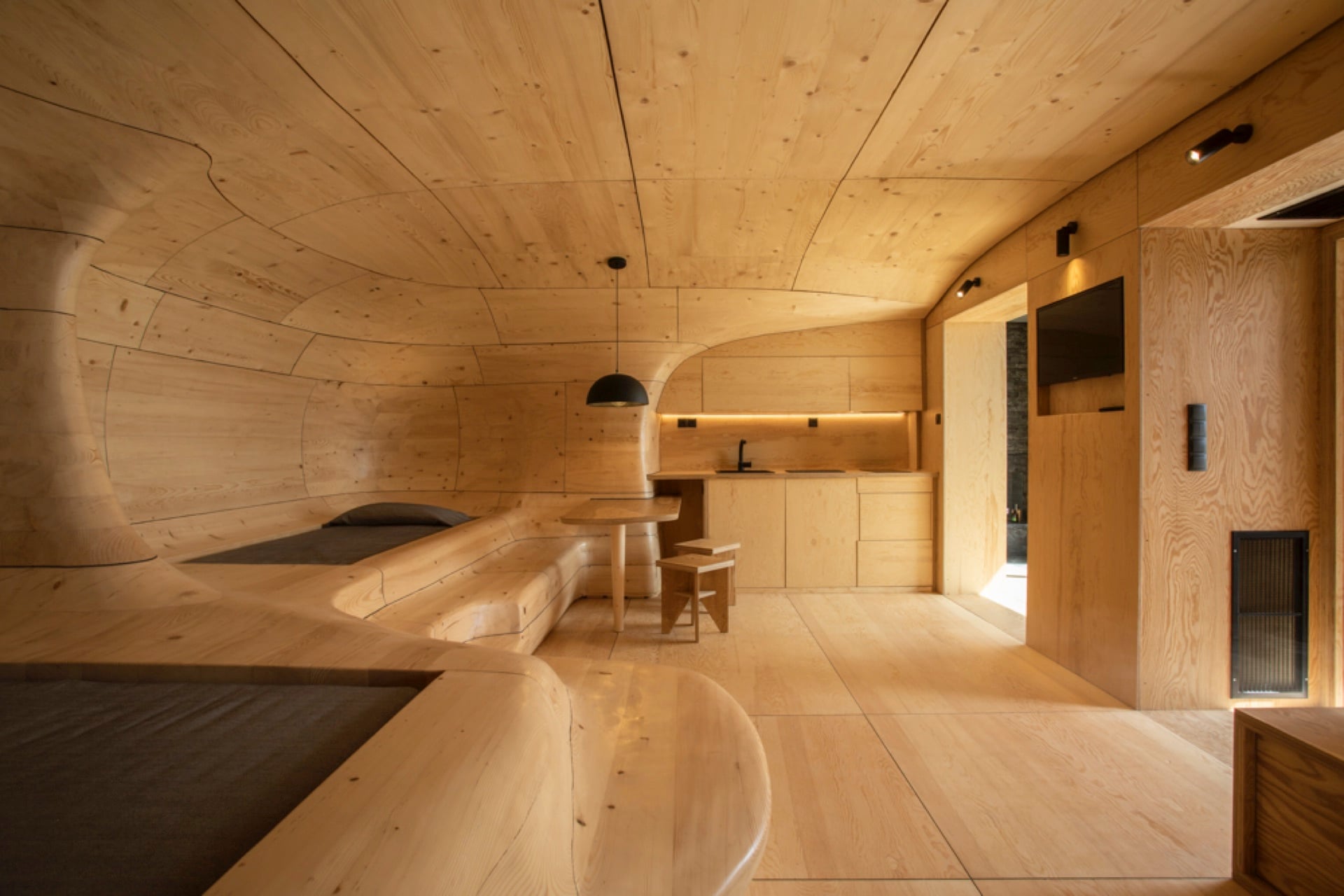 Wooden Cave, the suite carved out of wood | Collater.al